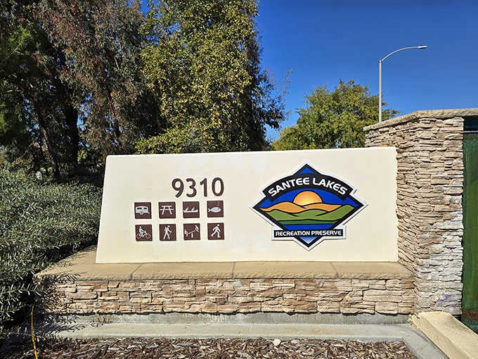 The preserve's welcoming entrance sign displays activity icons that promise something fun for every member of your crew.