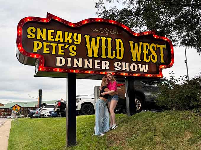 Two friends, one legendary sign, and a whole lot of anticipation for what's waiting inside.