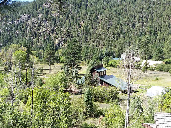 The kind of panoramic view that makes you forget you're clipped to a harness forty feet up.