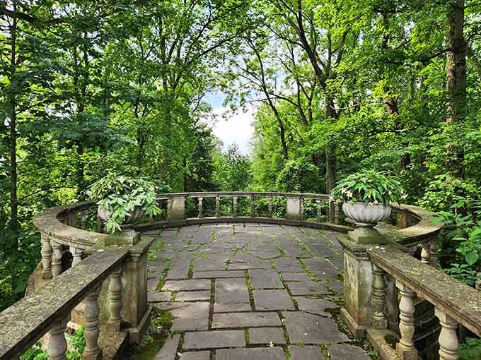 The West Terrace Overlook, where the stone balustrade and surrounding trees make you feel like you've earned something just by standing there.