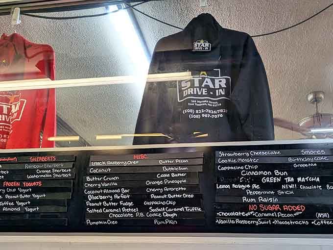 Star Drive-In gear displayed proudly behind the glass, because some places earn the right to put their name on a hoodie.