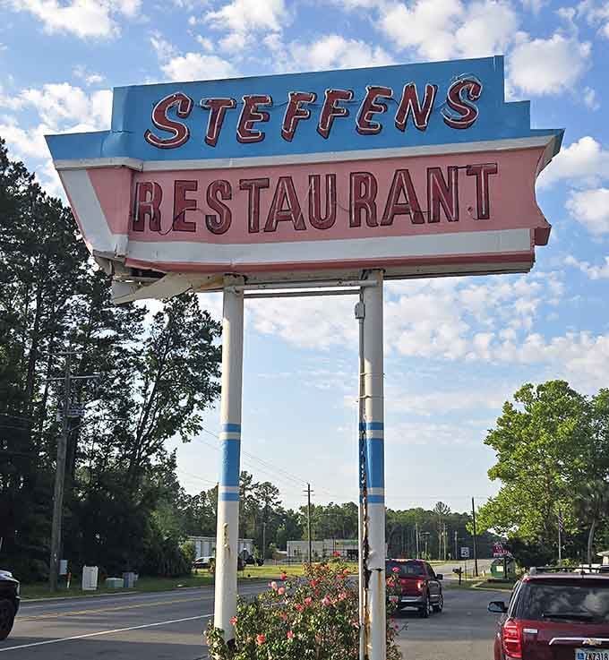 That retro sign standing tall against a blue Georgia sky is basically a landmark at this point. Pure nostalgia.