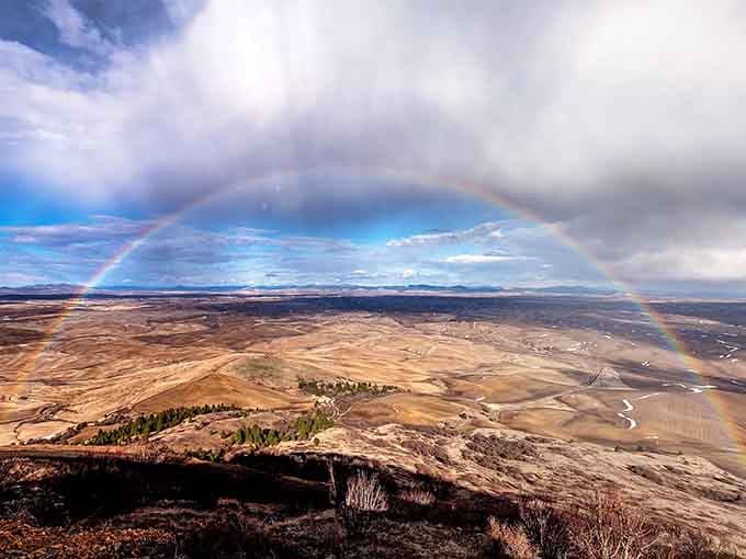 A rainbow arcs over the Palouse, because apparently this place wasn't already photogenic enough without special effects.
