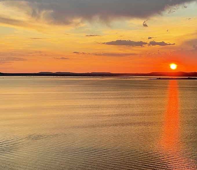 A Stillhouse Hollow sunset turns the entire sky into liquid gold, and no reservation is required.