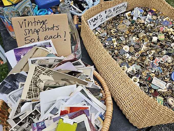 A basket of vintage pins and a pile of old snapshots, because someone's past is always someone else's treasure.