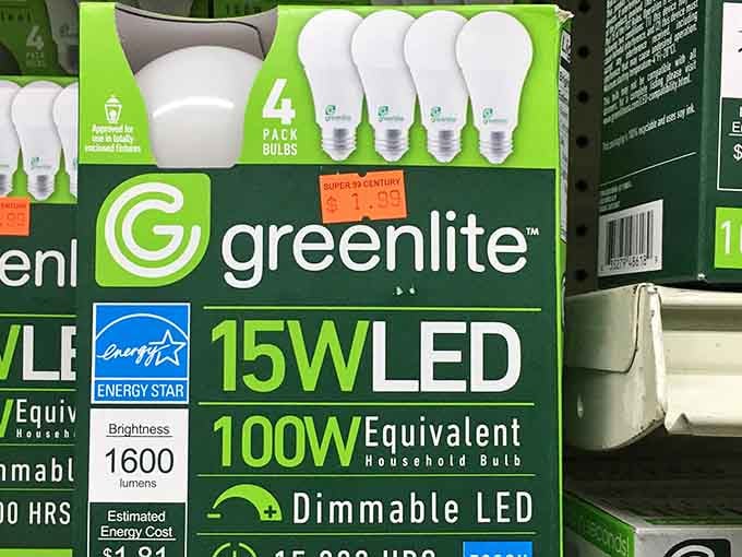 A four-pack of Greenlite 15W LED bulbs sitting right there on the shelf, proof that even the practical finds feel like a win here.