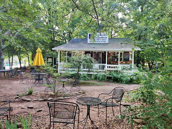 Iron chairs scattered under tall trees, a yellow umbrella catching the light, and coffee in hand. Georgia doesn't get better than this.
