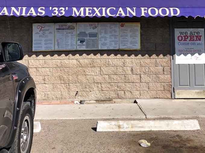 The full menu posted right outside means you can plan your order before the smell changes everything.
