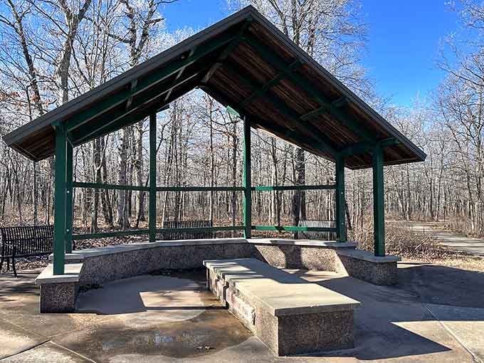 The covered shelter at the summit says, "Stay a while," and frankly, that's the best advice you'll get all day.