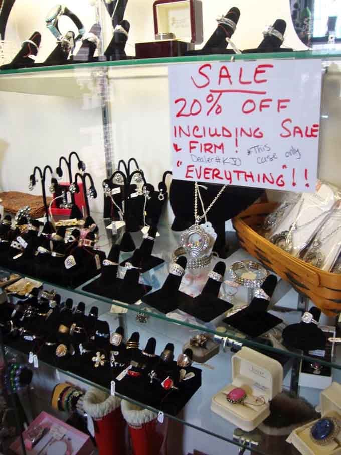 Rings, necklaces, and pendants filling a glass case with the kind of sparkle that stops you mid-stride.