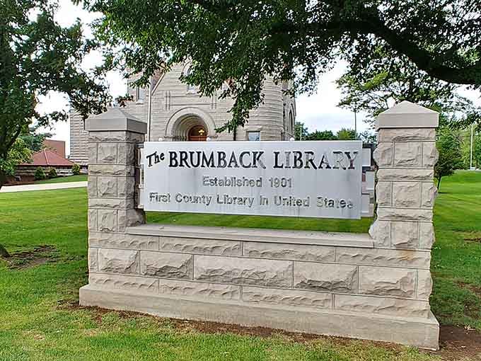 Signage proudly declaring "First County Library" status, because someone had to show everyone else how it's done.