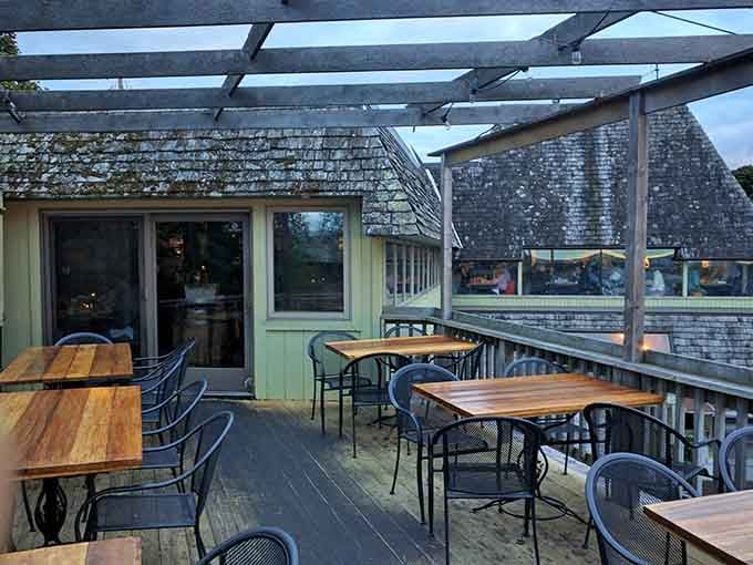 Evening settles over the deck as string lights promise magical dinners under the stars ahead.