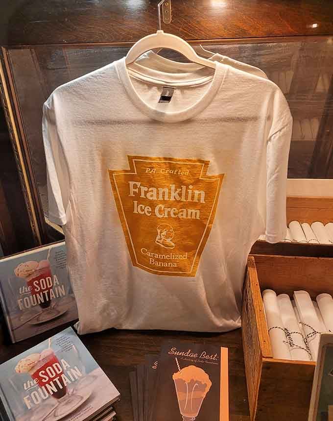 A Franklin Ice Cream t-shirt and soda fountain books on display, because some experiences deserve to be taken home with you.