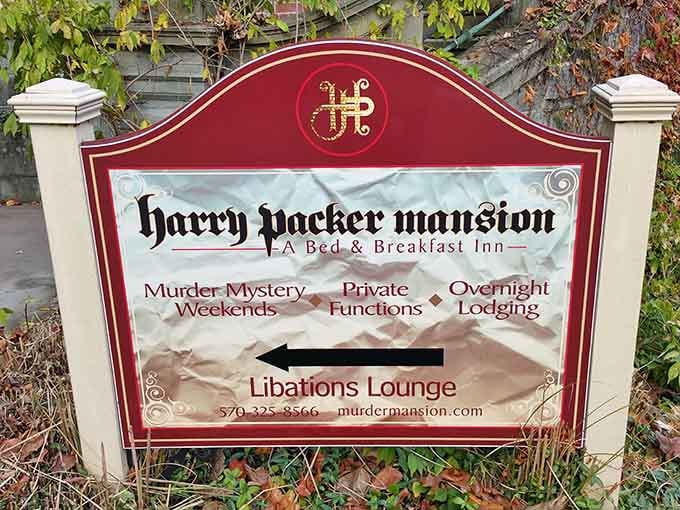 The sign says murder mystery weekends, overnight lodging, and libations lounge. Honestly, that's a pretty compelling weekend itinerary right there.