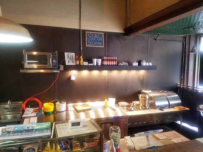 The kitchen where decades of hot dog magic happens, efficient and honest as the day is long.