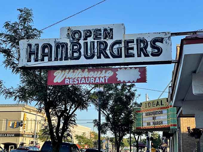 That weathered neon sign has been calling hungry travelers off the road for longer than most of us can remember.