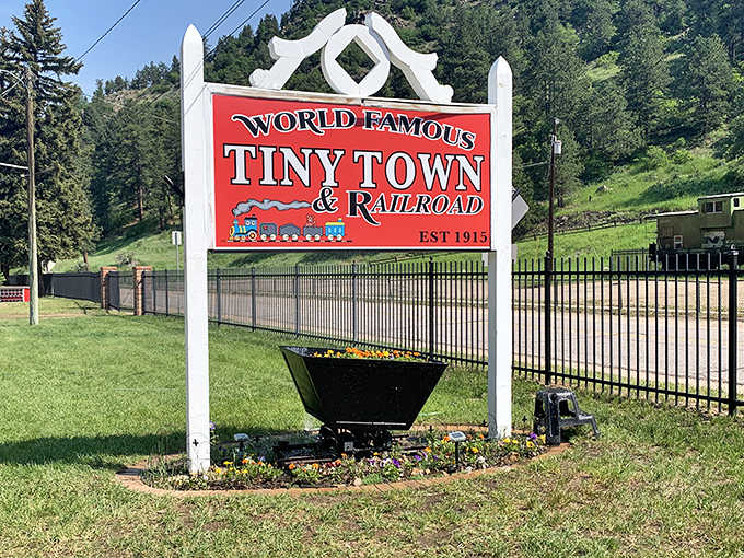 World Famous Tiny Town & Railroad, Est. 1915 on a bold red sign, because some legends announce themselves without apology.