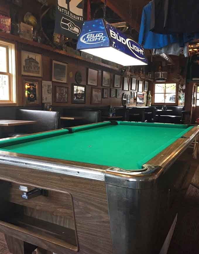 The pool table waits patiently for after-dinner games, because Toby's knows a great tavern needs more than food.