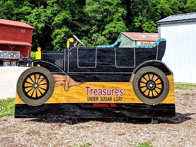 A hand-painted vintage car sign out front that basically says, "You've arrived somewhere worth stopping for."