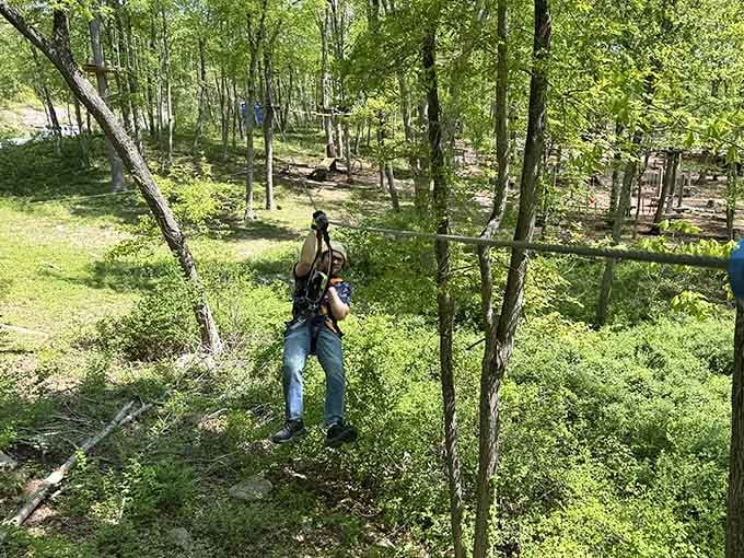 Clipped in and gliding through the Connecticut forest, the zip line at TreeTrails Adventures delivers every time.