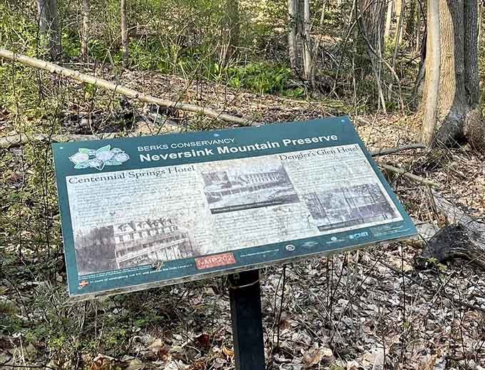 A trailside sign tells the story of the hotels that once stood here. Reading history has never felt this surprisingly satisfying.
