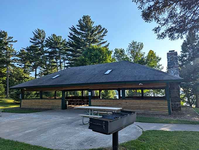 The picnic shelter stands ready for family reunions, offering shade, grills, and lake views that make everyone actually enjoy gathering.