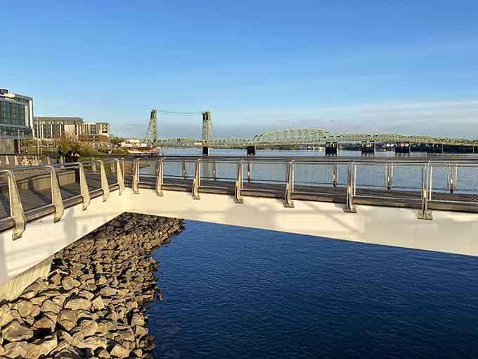 The promenade curves toward the Interstate Bridge like it knows exactly where the best view is hiding.