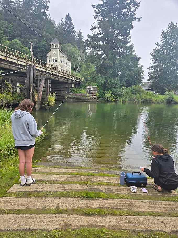 Two kids fishing beside an old bridge in Skamokawa. Some afternoons are simply too good to rush.