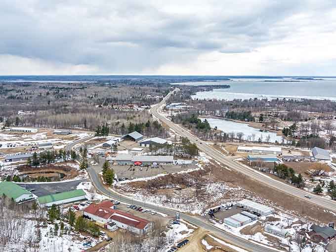 Aerial winter views showcase Walker's perfect position between town life and endless lake country beauty beyond.