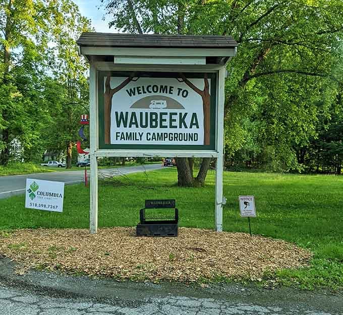 The welcome sign greets visitors with simple charm, promising the kind of getaway that doesn't require a passport or patience.
