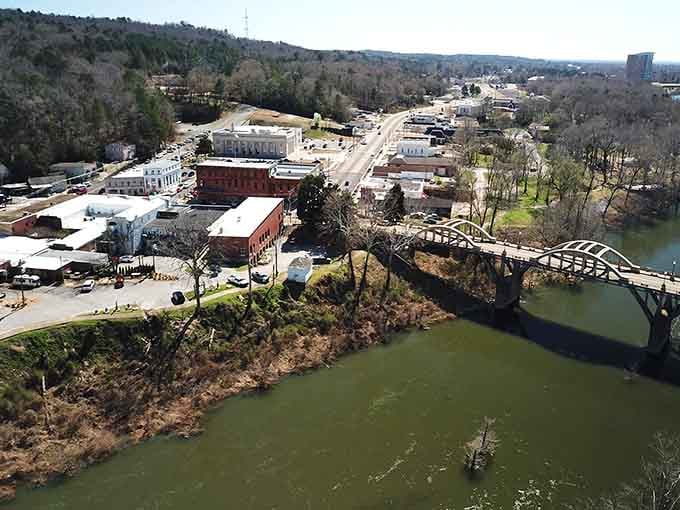 Aerial views reveal Wetumpka's perfect blend of river, town, and nature working together in unexpected harmony.