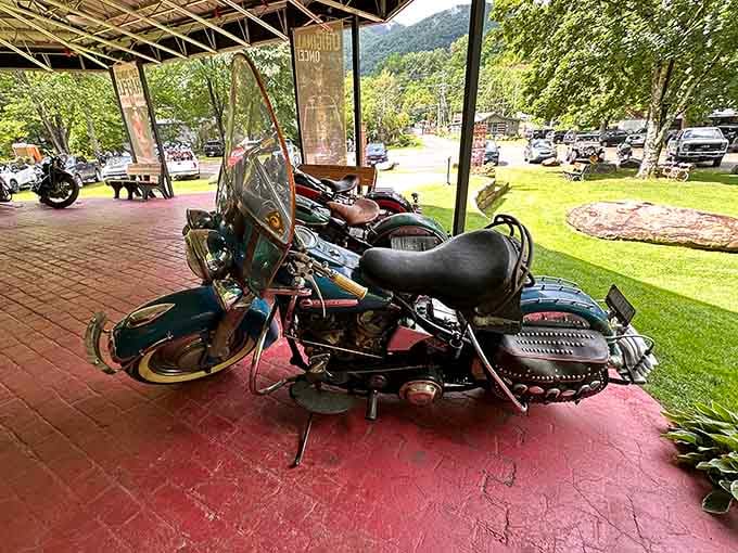 Sitting on the open porch with the Smoky Mountains rising behind it, this weathered Harley looks like it belongs on a postcard and knows it.