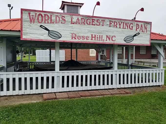 Bold red letters on weathered white wood announce it plainly: Rose Hill, NC means serious frying business.