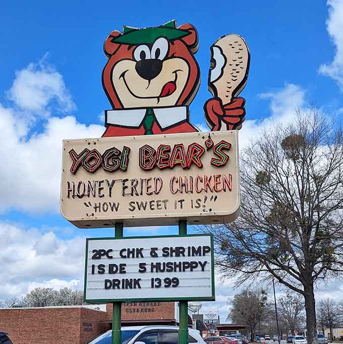 Yogi Bear holding a chicken leg against a Carolina sky. Honestly, this sign is a national treasure.