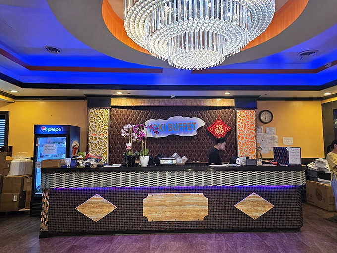 A sparkling chandelier, fresh orchids, and a glowing sign greet you. Yoki Buffet makes a memorable first impression.