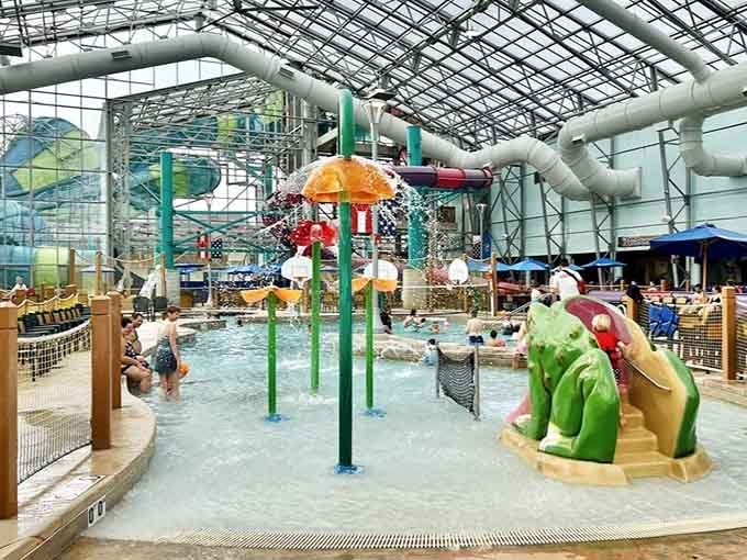 Flower-shaped splash fountains, a grinning frog sculpture, and slides towering in the background, the kids' area here means serious business.