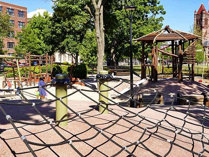 Those rope climbing webs stretch like giant spider silk across the playground, inviting young adventurers to test their courage.