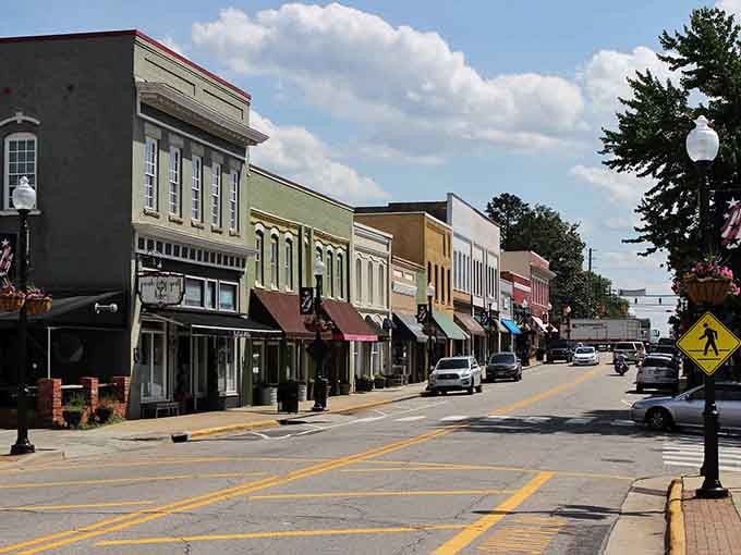 Salem Street's colorful awnings and flower baskets make Apex's downtown feel like a warm hug you never want to leave.