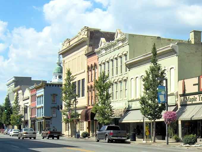 Ornate cornices and colorful awnings line this street like a greatest hits album of American small-town charm.