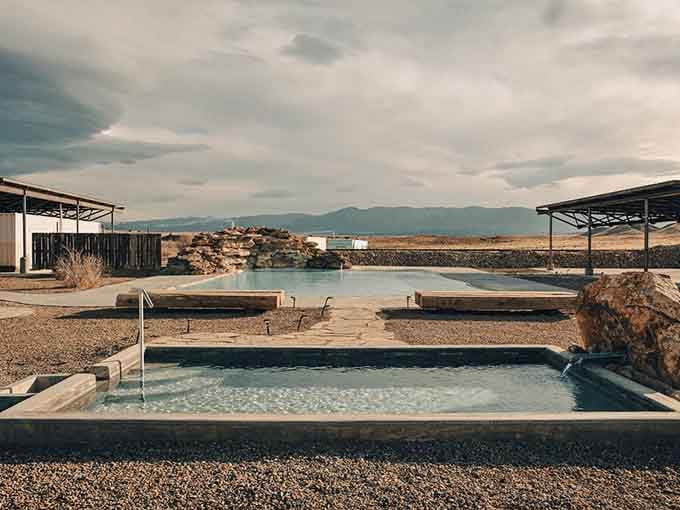 Multiple soaking pools stretch across the desert landscape, each one offering mountain views that'll make you forget your troubles.
