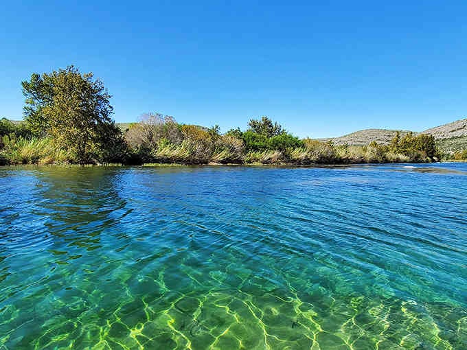 Water so clear and blue you'll swear someone dropped food coloring in it—nature's own swimming pool awaits.