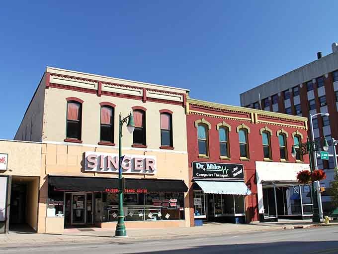 Classic storefronts with vintage signage remind you that some towns still value character over cookie-cutter chain stores.