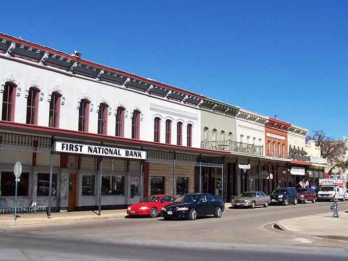 Granbury's historic square stands proud under a wide Texas sky, where ornate facades tell stories better than any history book.