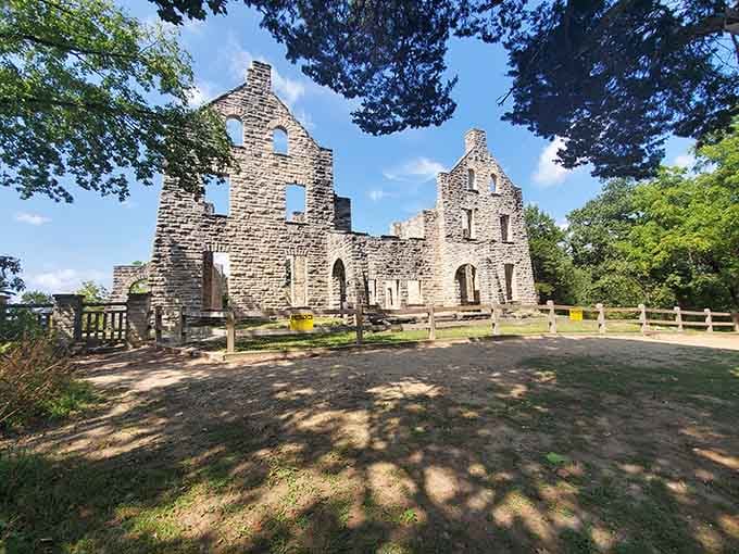 These stone walls standing proud against blue sky prove that even ruins can be absolutely magnificent.