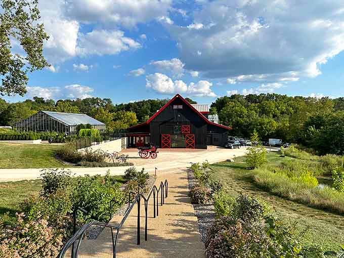 That bold black barn with red trim isn't just pretty, it's basically Kentucky showing off its best outfit.