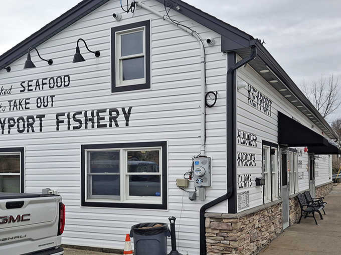 That hand-painted menu on the side wall tells you flounder, haddock, and clams are waiting inside.