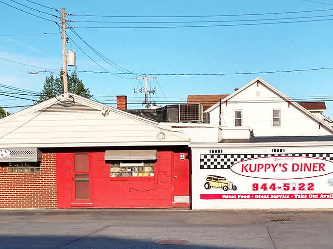 That bold red wall and checkered flag sign say one thing loud and clear: great food lives here.