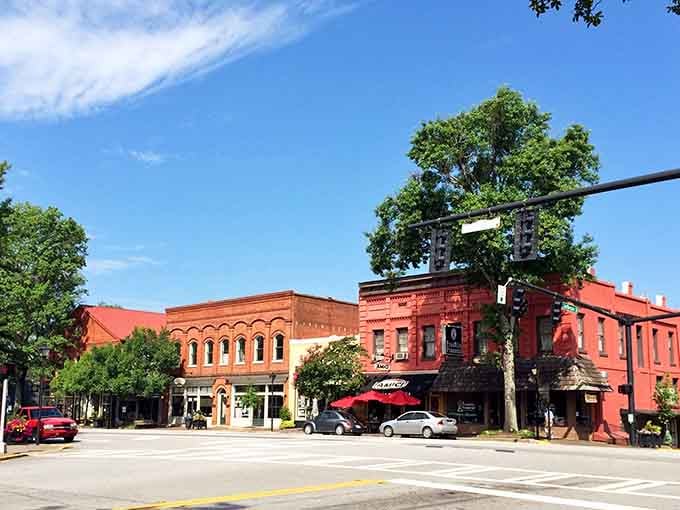 Madison's red brick storefronts glow under a brilliant blue sky, proof that small-town charm never goes out of style.