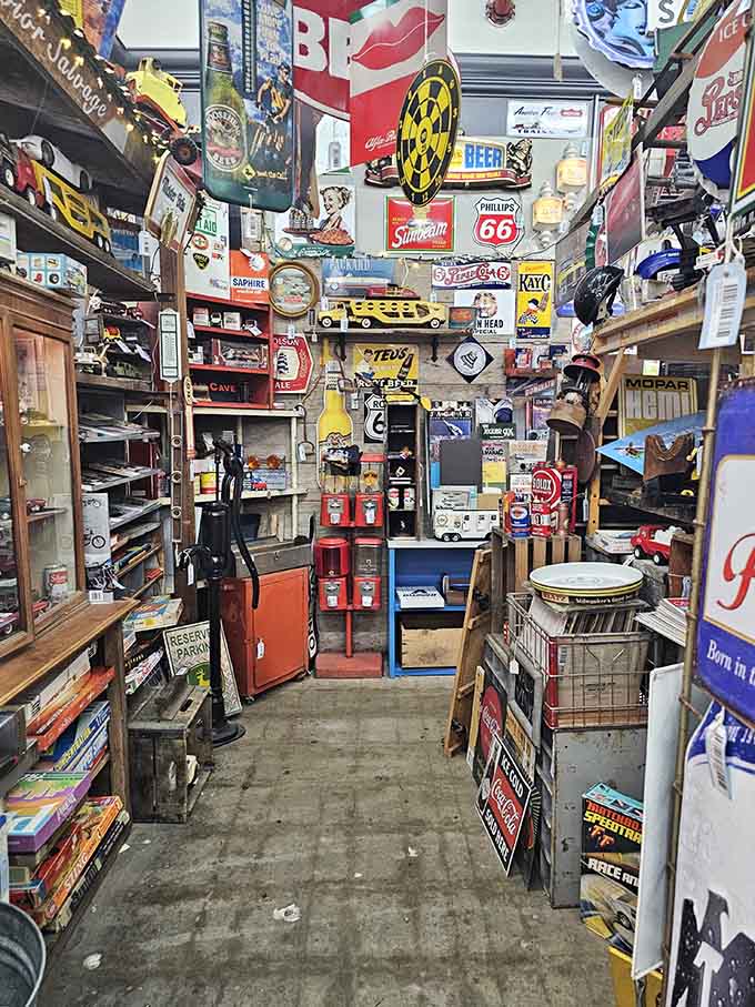 Every vintage sign tells a story, and this narrow aisle is practically writing an entire novel of Americana.