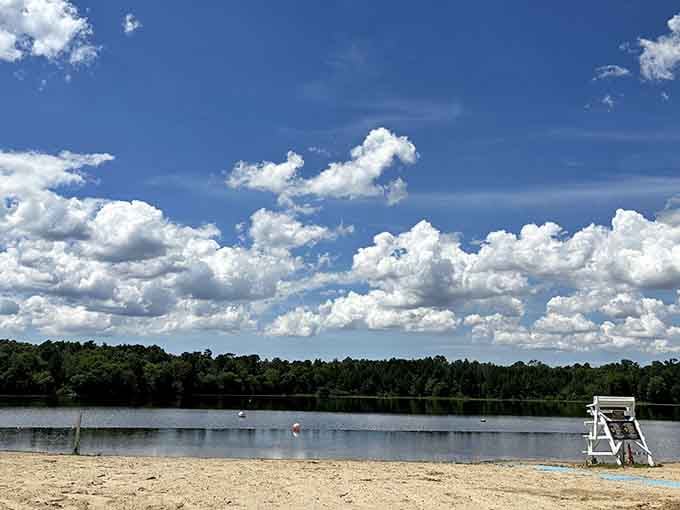 Picture this: a pristine sandy beach with clouds that look like cotton candy floating overhead.